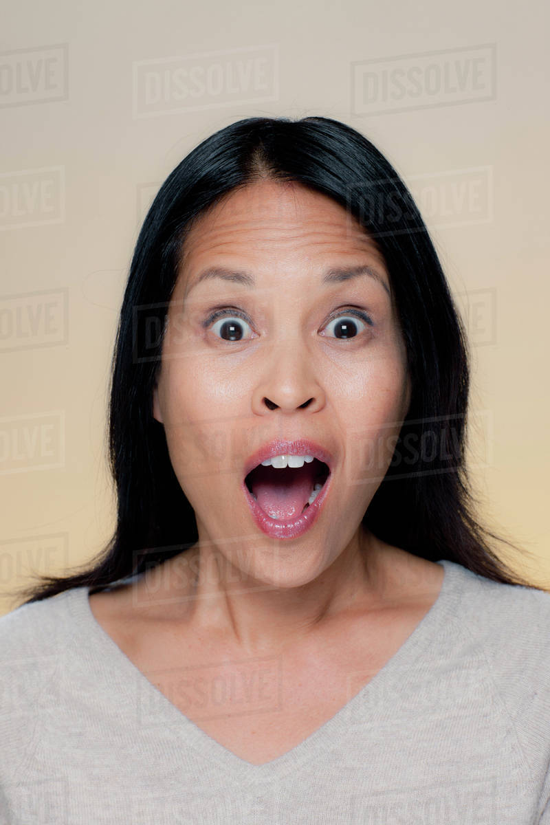 Portrait of woman with astonished expression - Royalty-free Stock Photo ...