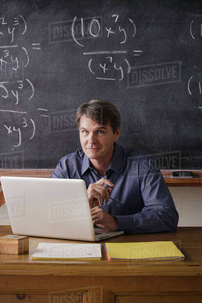 Portrait of maths teacher - Royalty-free Stock Photo | Dissolve