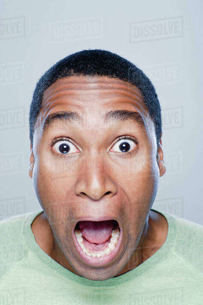 Portrait of screaming young man, studio shot - Royalty-free Stock Photo ...