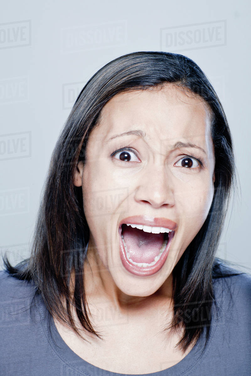 Portrait of screaming young woman, studio shot - Royalty-free Stock ...