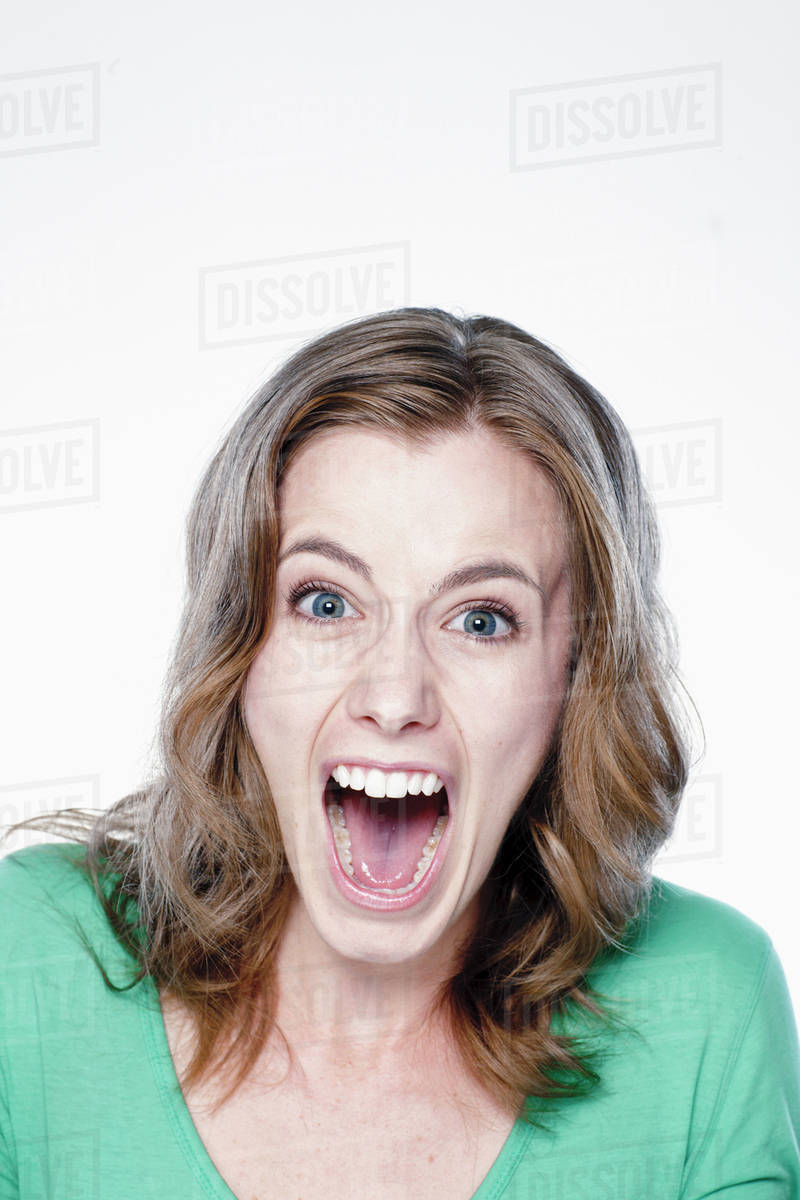 Portrait of screaming young woman, studio shot - Royalty-free Stock ...