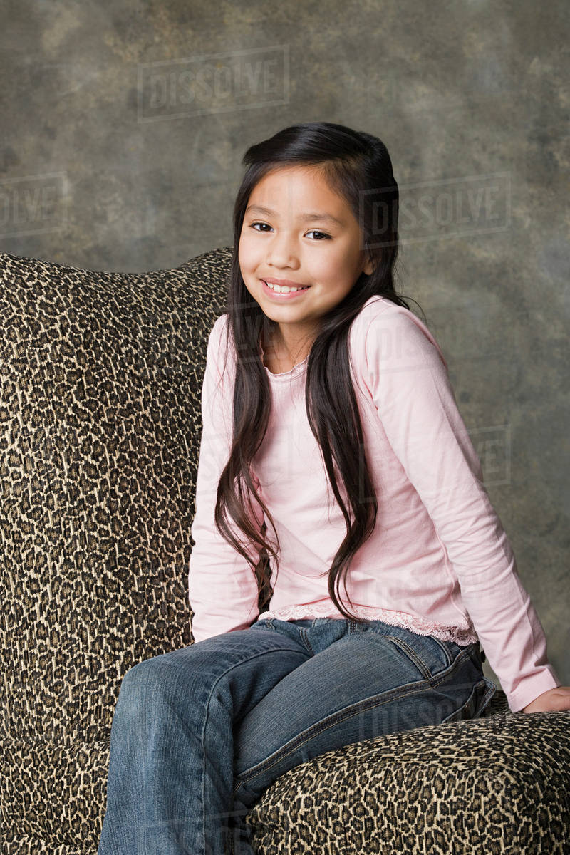 Portrait of smiling girl (8-9), studio shot - Royalty-free Stock Photo ...