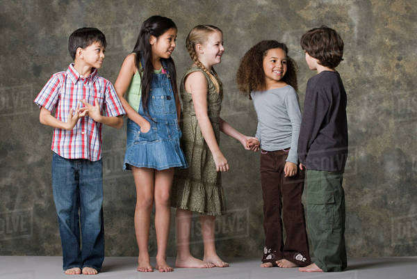 Children (6-7, 8-9) playing together, studio shot - Royalty-free Stock ...