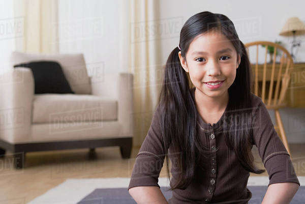 Portrait of smiling girl (8-9) - Royalty-free Stock Photo | Dissolve