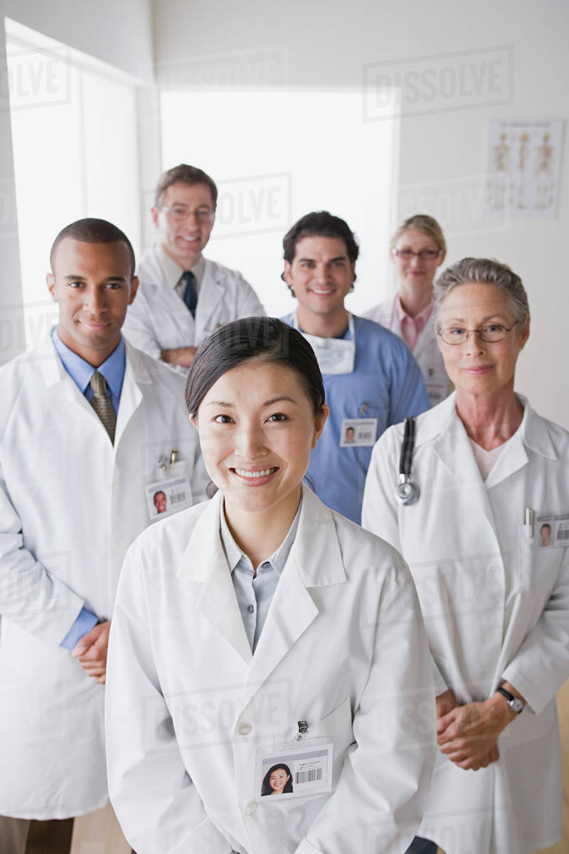 Group portrait of smiling doctors - Royalty-free Stock Photo | Dissolve