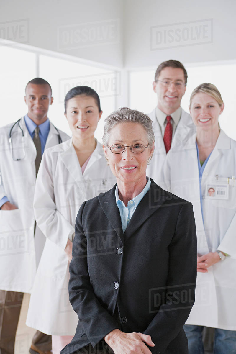 Group portrait of smiling doctors - Royalty-free Stock Photo | Dissolve