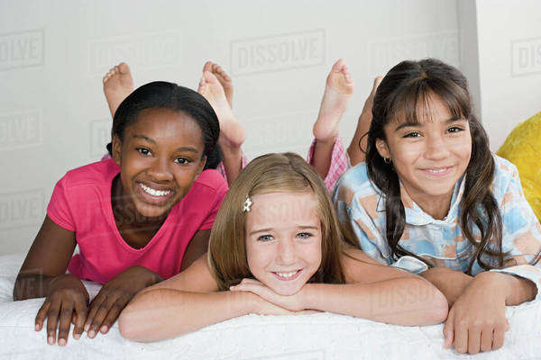 Three girls (10-11) having fun at slumber party - Royalty-free Stock ...