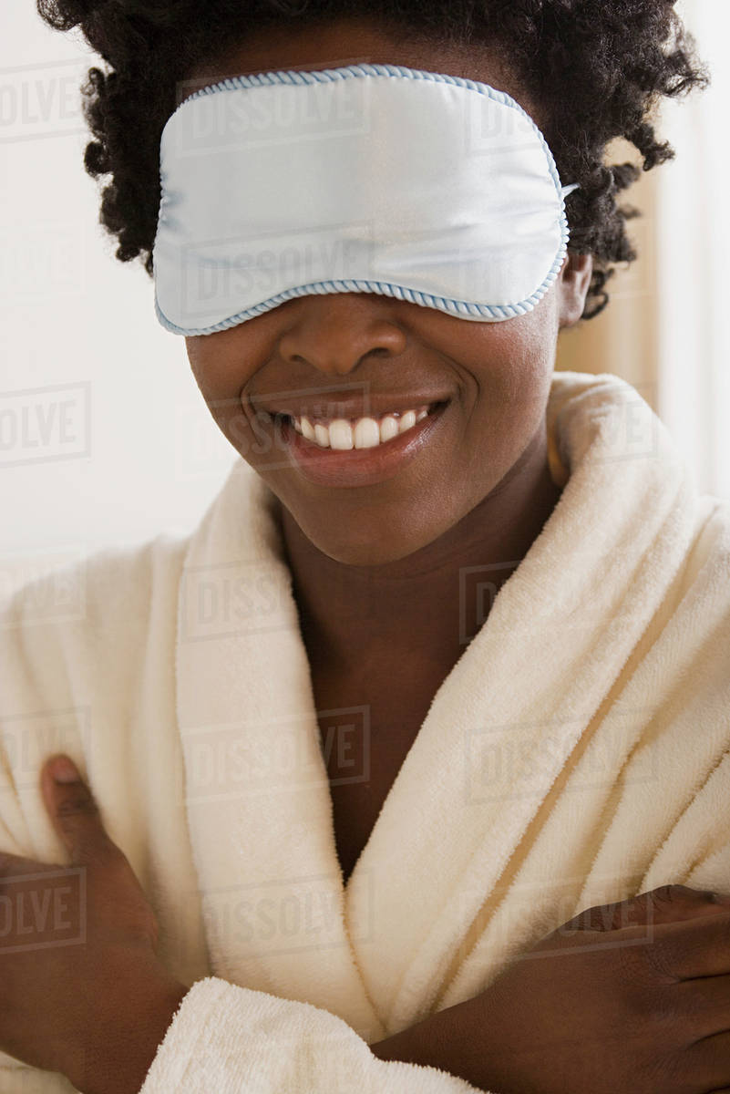 Woman wearing eye mask - Royalty-free Stock Photo | Dissolve