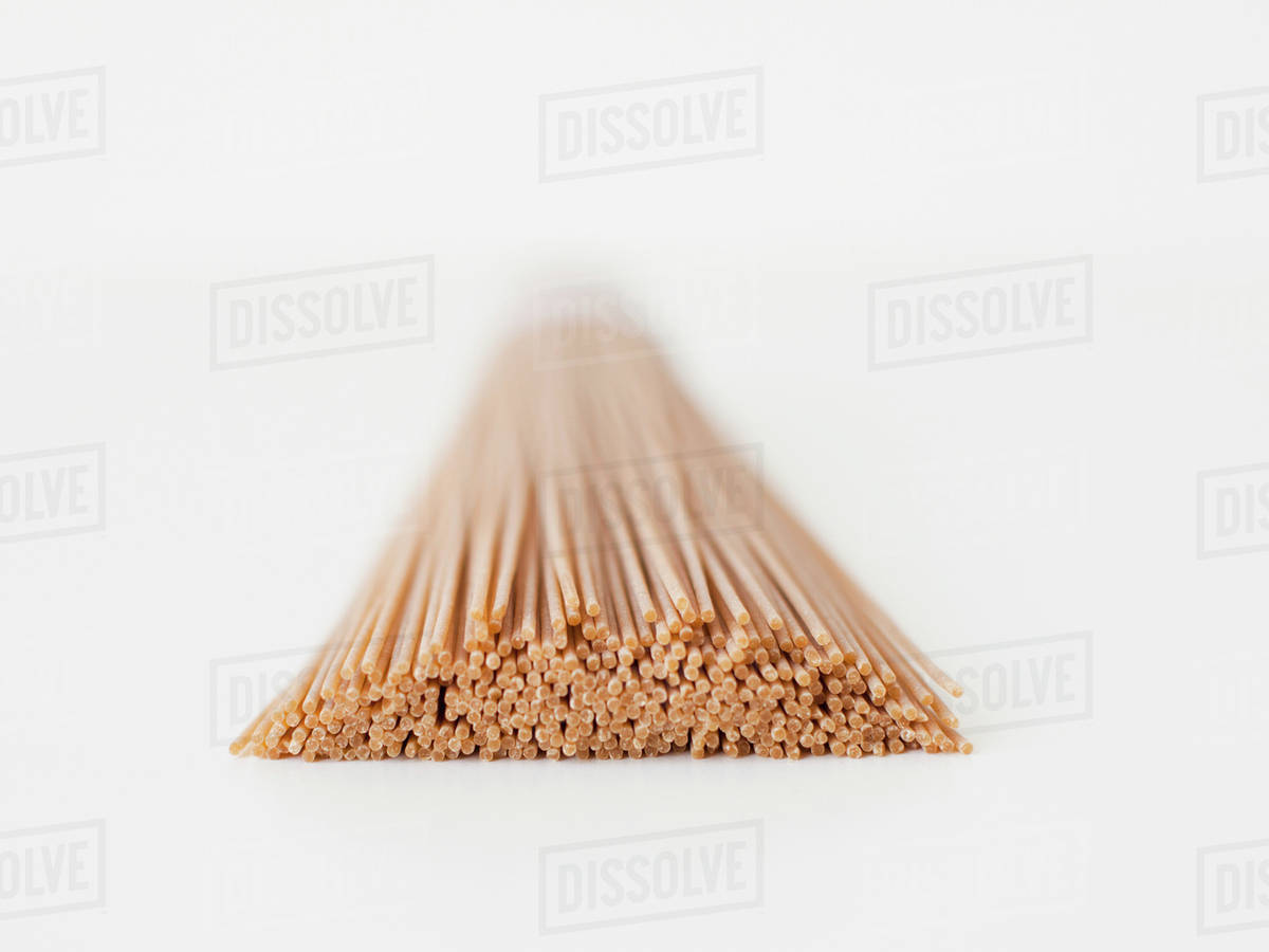 Bunch of dried spaghetti, close-up - Royalty-free Stock Photo | Dissolve