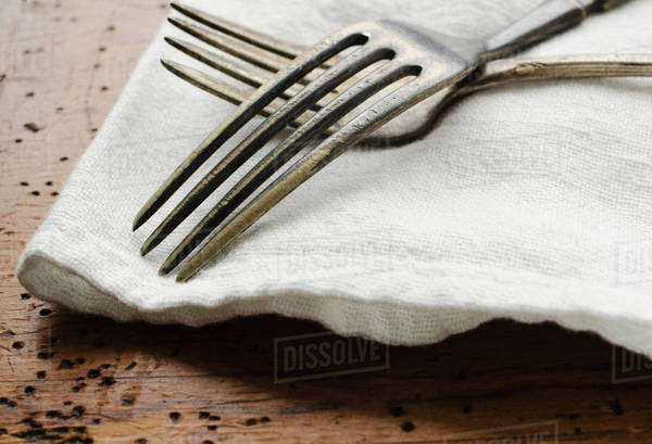 Two forks on napkin - Royalty-free Stock Photo | Dissolve