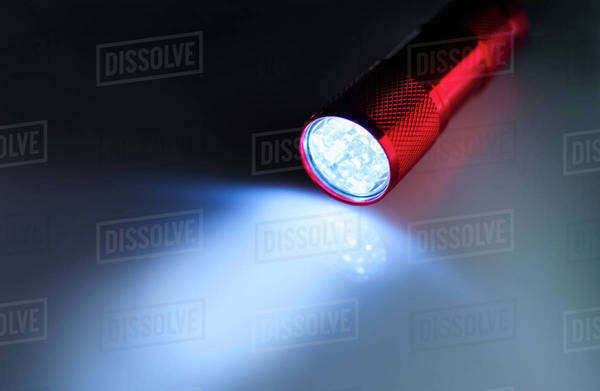 Illuminated flashlight - Royalty-free Stock Photo | Dissolve