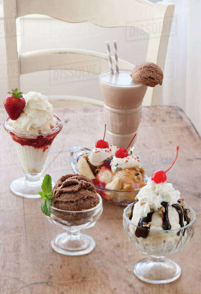 Selection of ice cream on table - Royalty-free Stock Photo | Dissolve