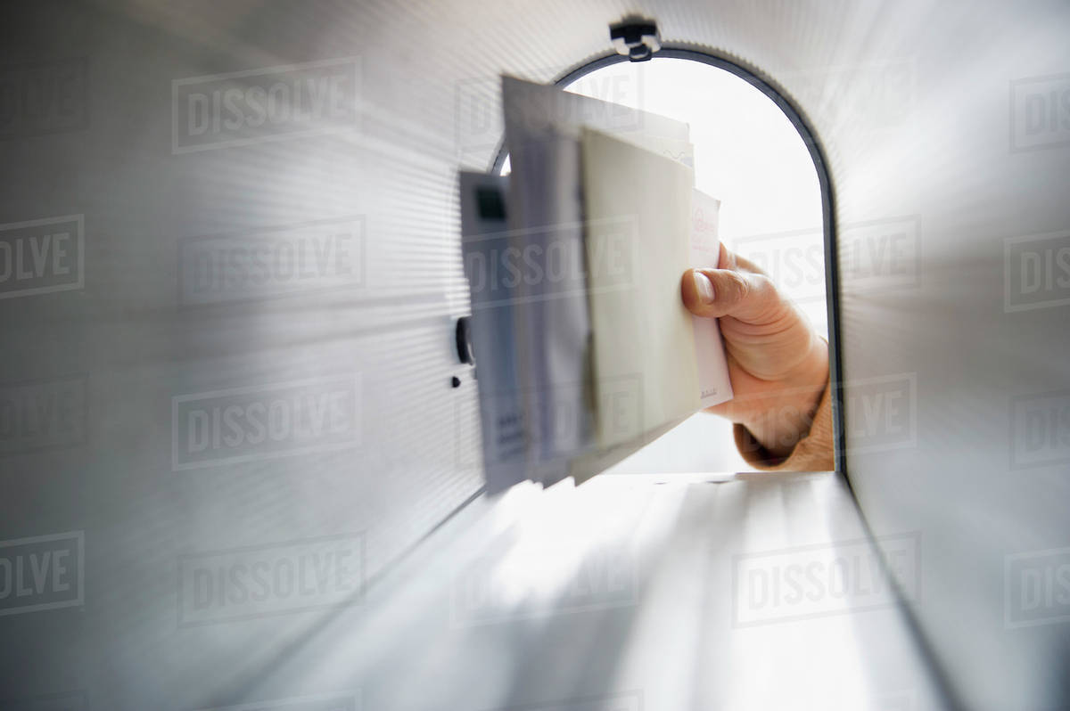 Close up Of Man s Hand Removing Letters From Letter Box Stock Photo Close up Of Man s Hand Removing Letters From Letter Box Stock Photo