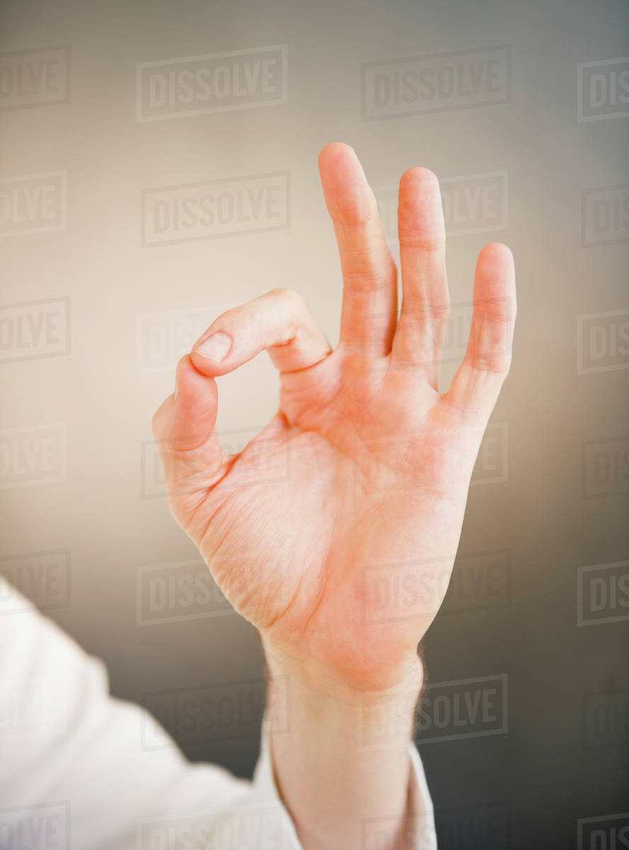 Hand showing okay sign - Royalty-free Stock Photo | Dissolve