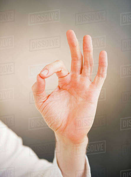Hand showing okay sign - Royalty-free Stock Photo | Dissolve