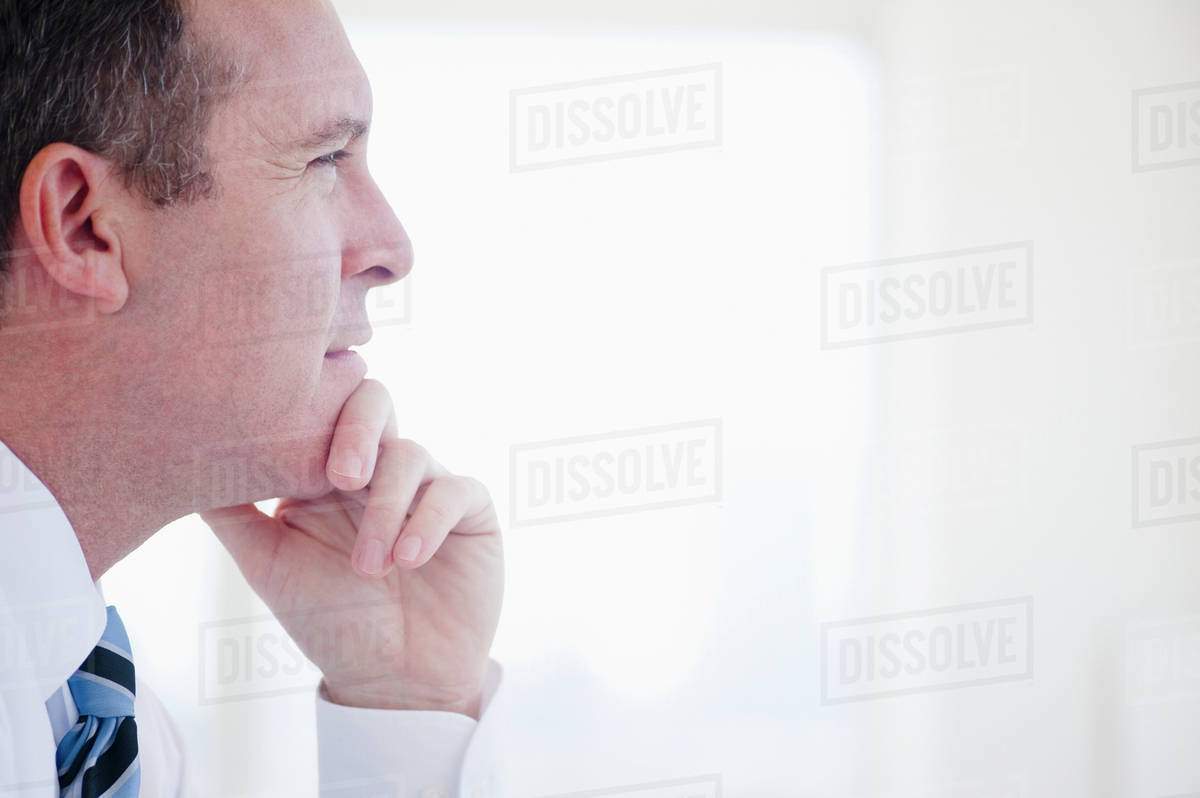 Profile of thinking businessman - Royalty-free Stock Photo | Dissolve
