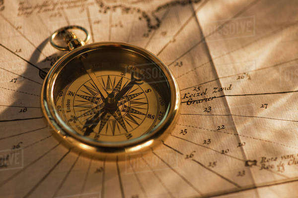Compass on map - Stock Photo - Dissolve