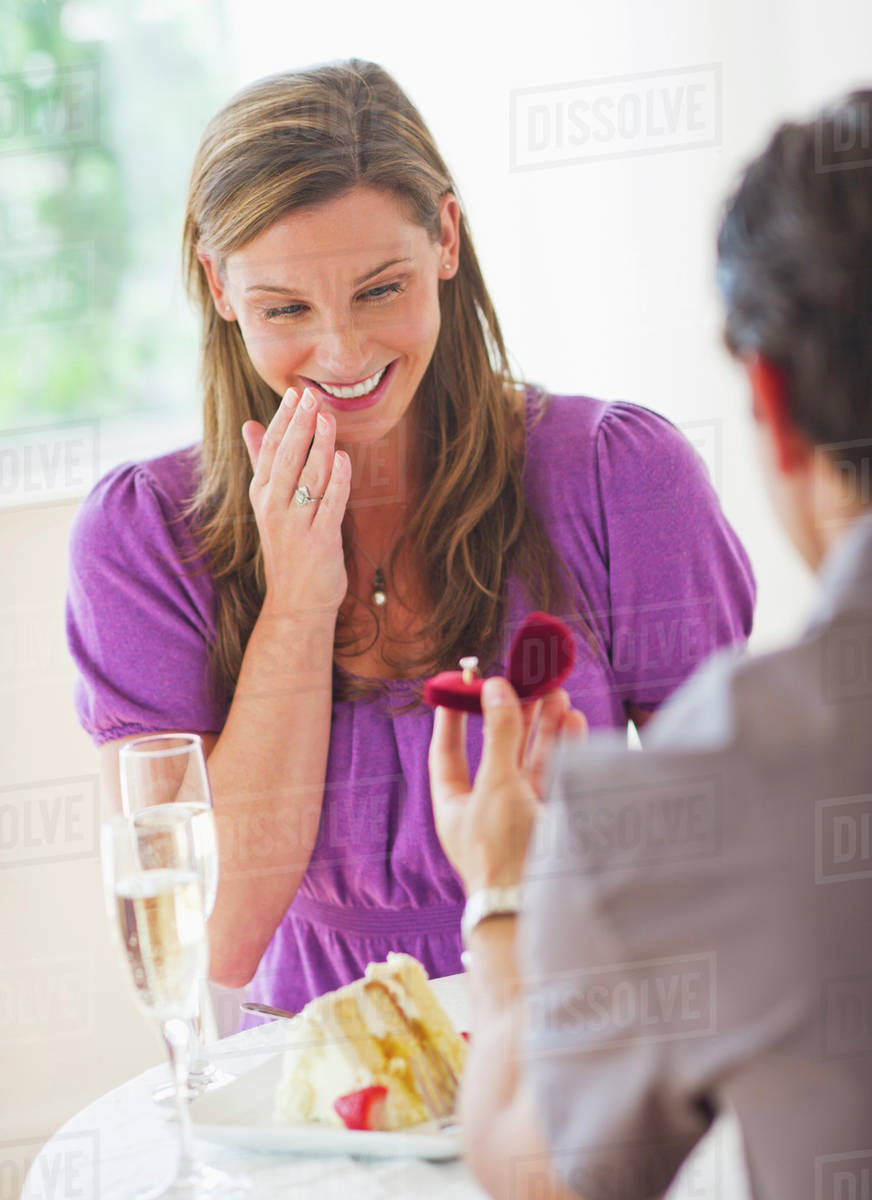 Man proposing to woman - Royalty-free Stock Photo | Dissolve