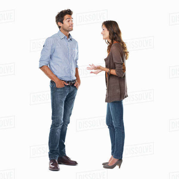 Studio shot of young couple having conversation - Royalty-free Stock ...