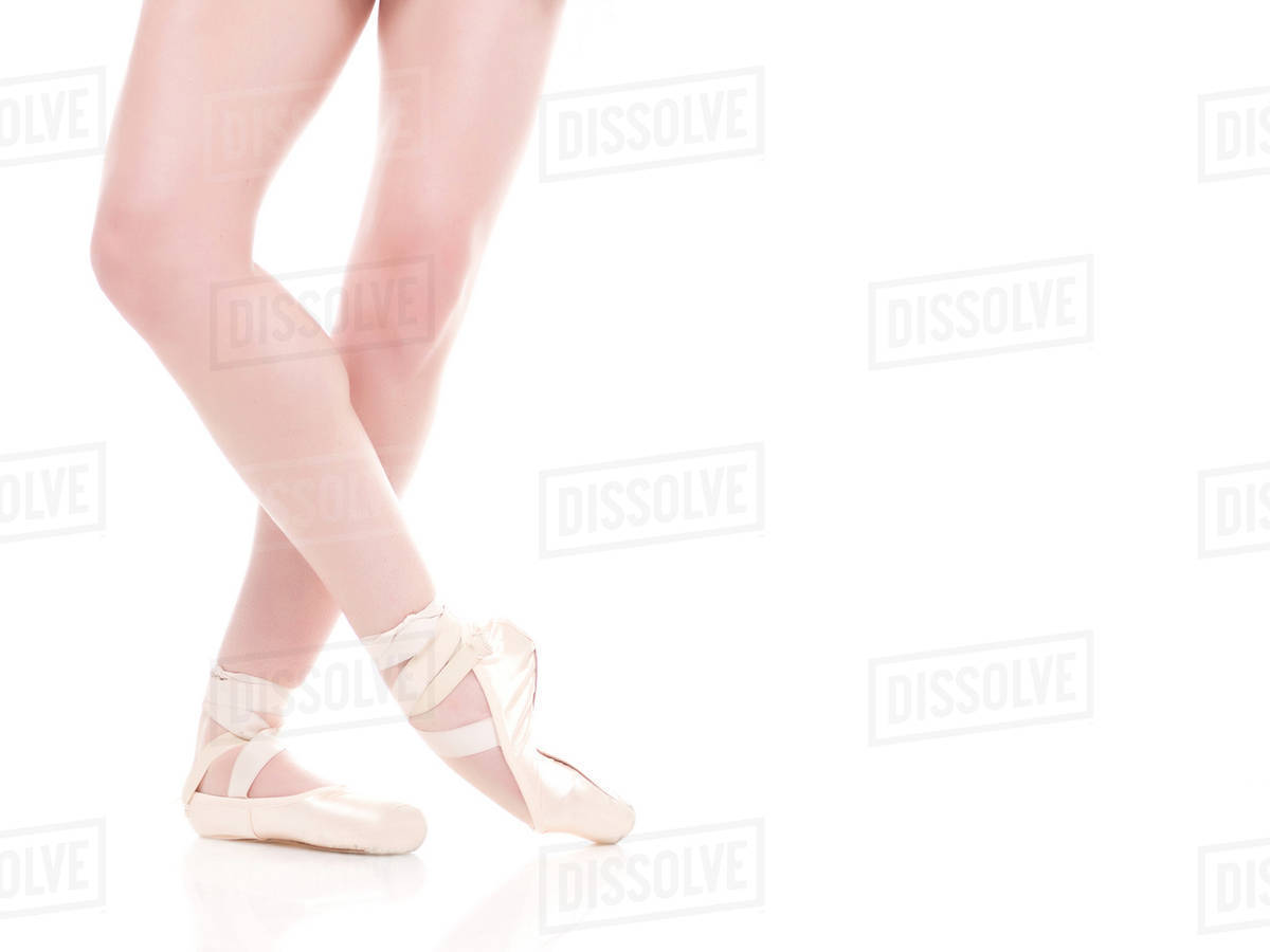 Ballet dancer's legs, studio shot - Stock Photo - Dissolve