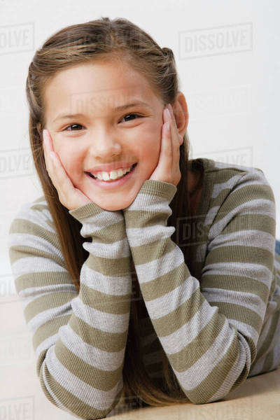 Studio portrait of girl (8-9) - Royalty-free Stock Photo | Dissolve