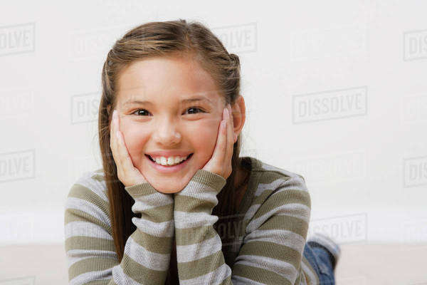 Studio portrait of girl (8-9) - Royalty-free Stock Photo | Dissolve