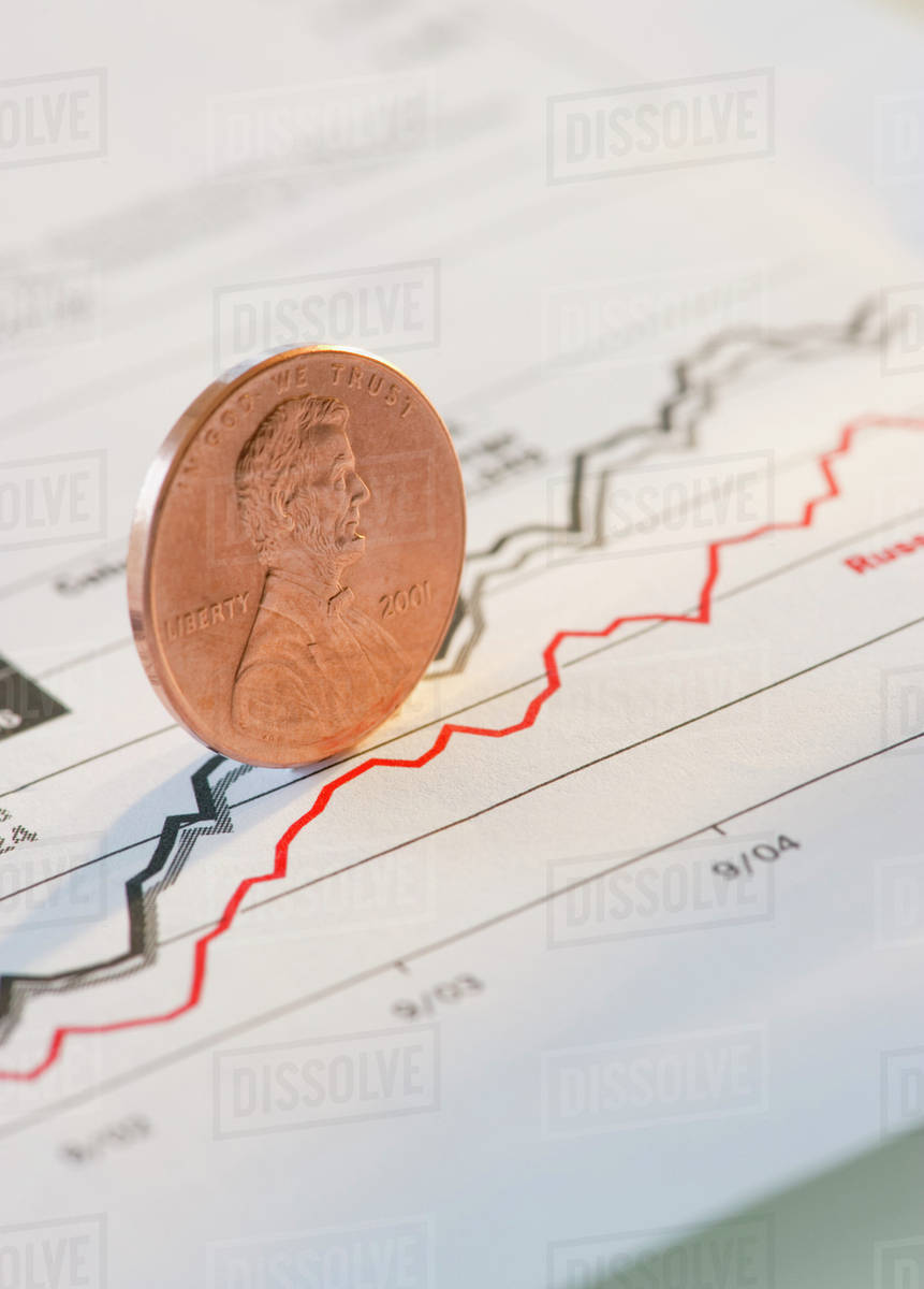 Penny on a graph - Stock Photo - Dissolve
