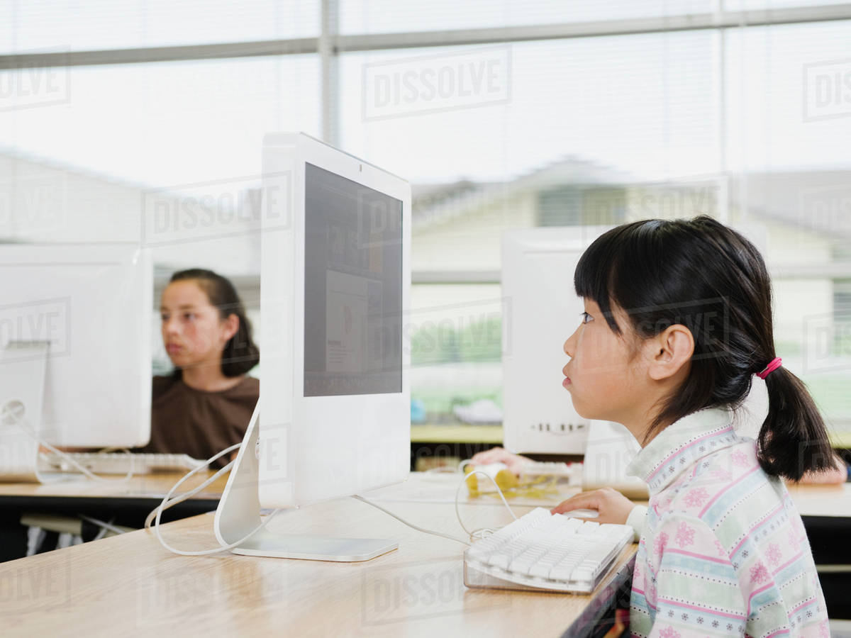 Students working on computers in classroom - Royalty-free Stock Photo ...