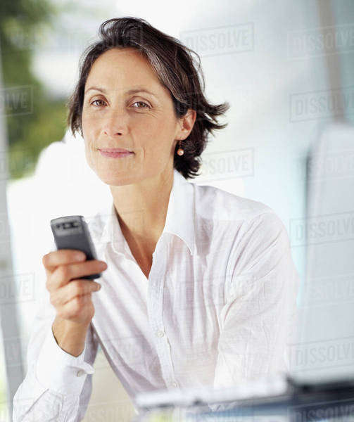 Woman texting - Royalty-free Stock Photo | Dissolve
