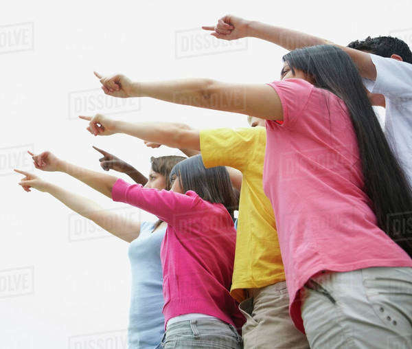 Group of friends pointing - Royalty-free Stock Photo | Dissolve