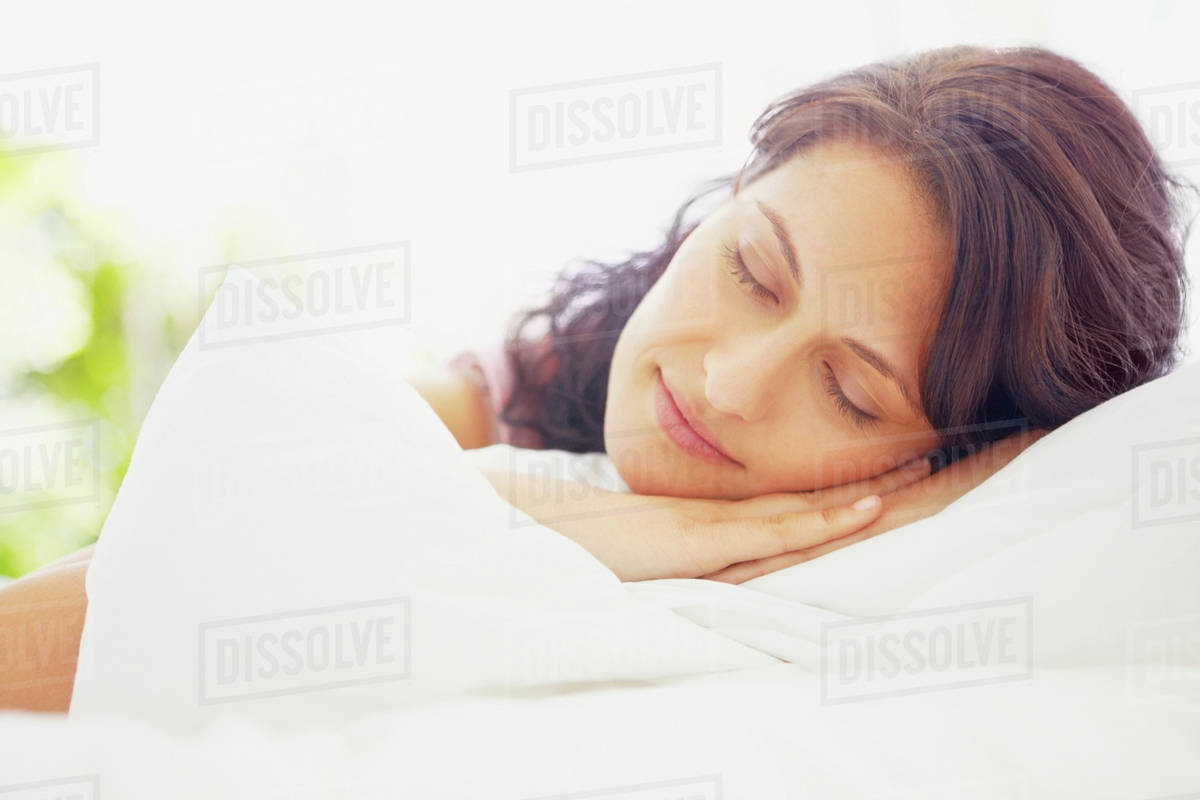 Woman napping - Royalty-free Stock Photo | Dissolve