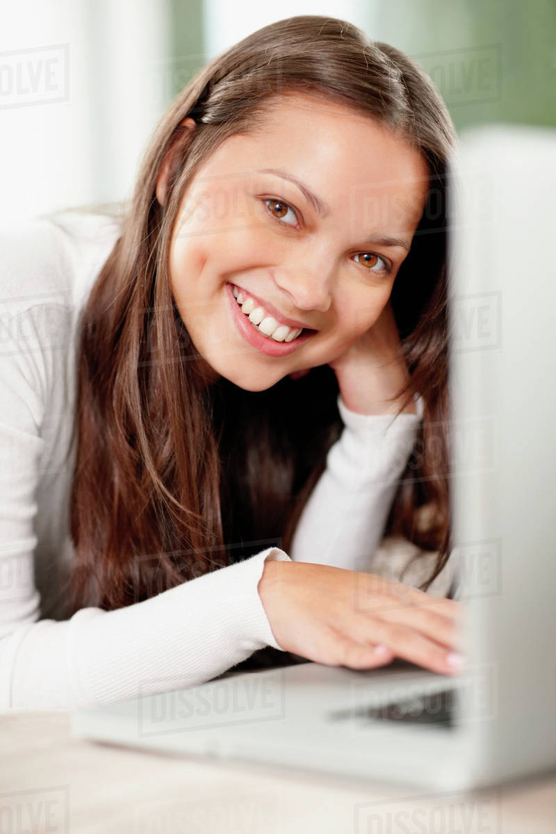 Woman browsing the internet - Royalty-free Stock Photo | Dissolve