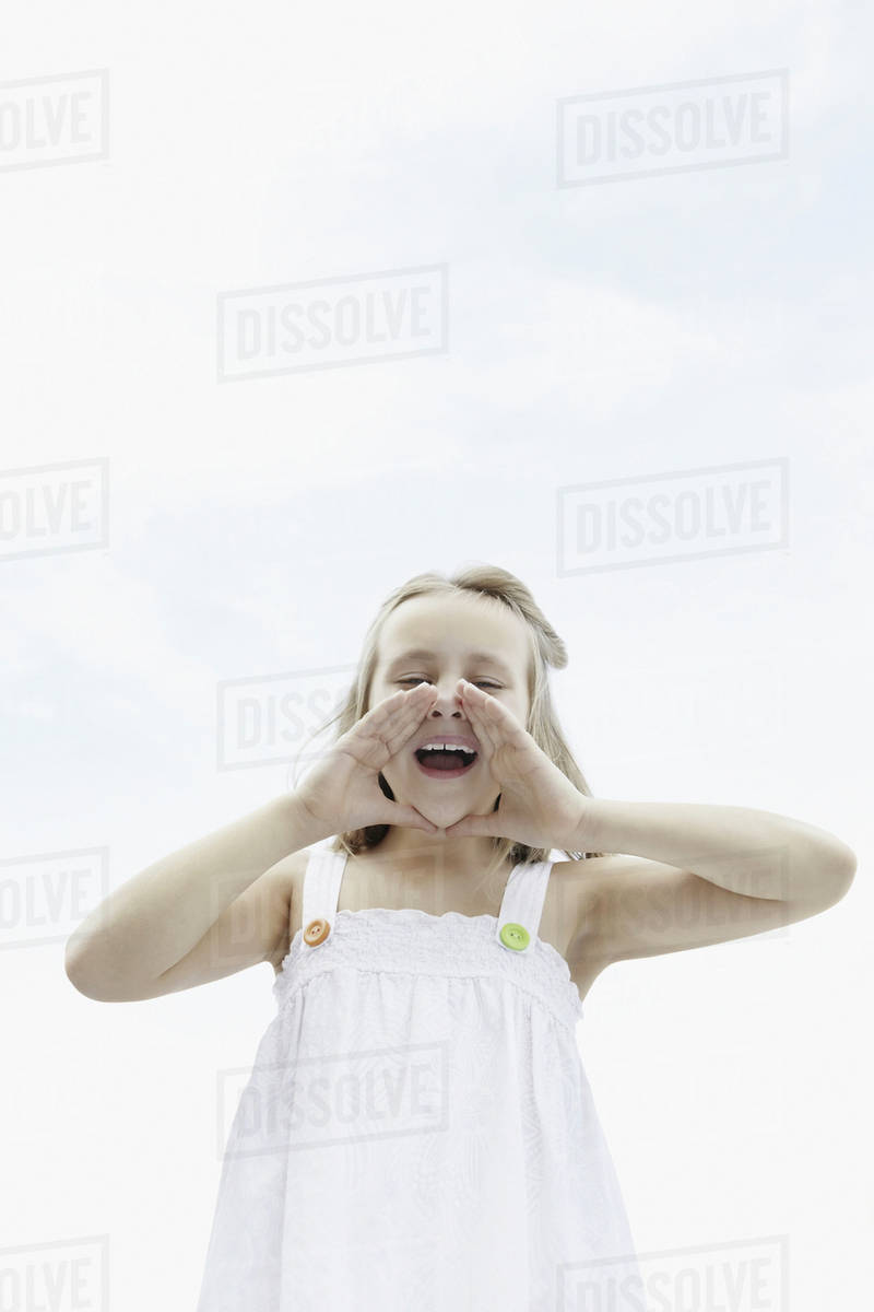 Cute girl shouting - Royalty-free Stock Photo | Dissolve