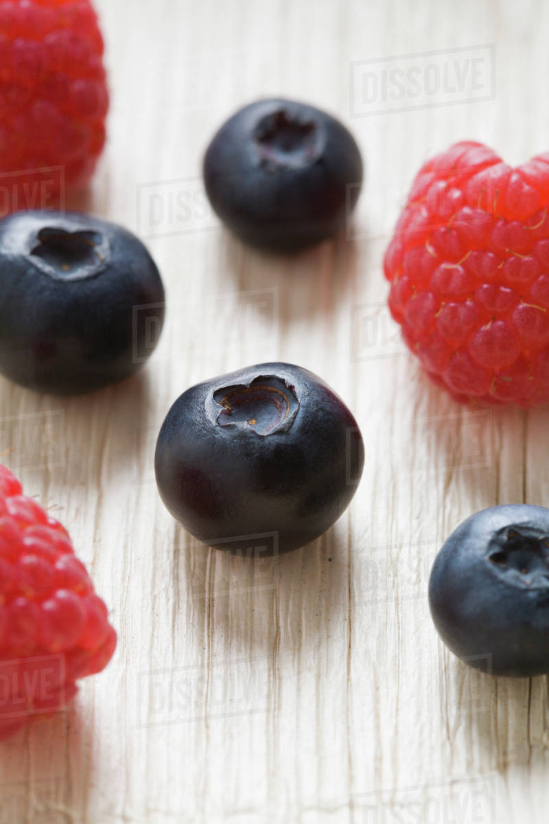 Blueberries and raspberries - Stock Photo - Dissolve