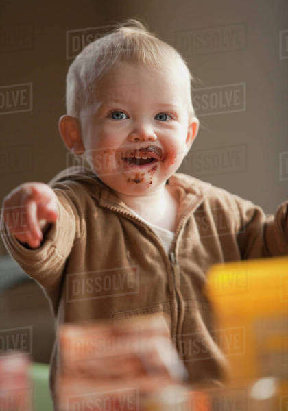 Baby with messy face - Royalty-free Stock Photo | Dissolve