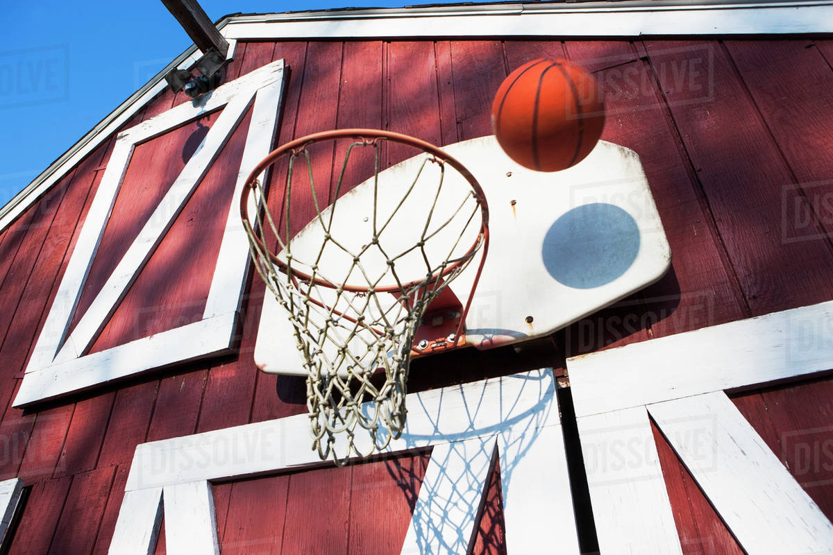 Basketball outside barn - Royalty-free Stock Photo | Dissolve