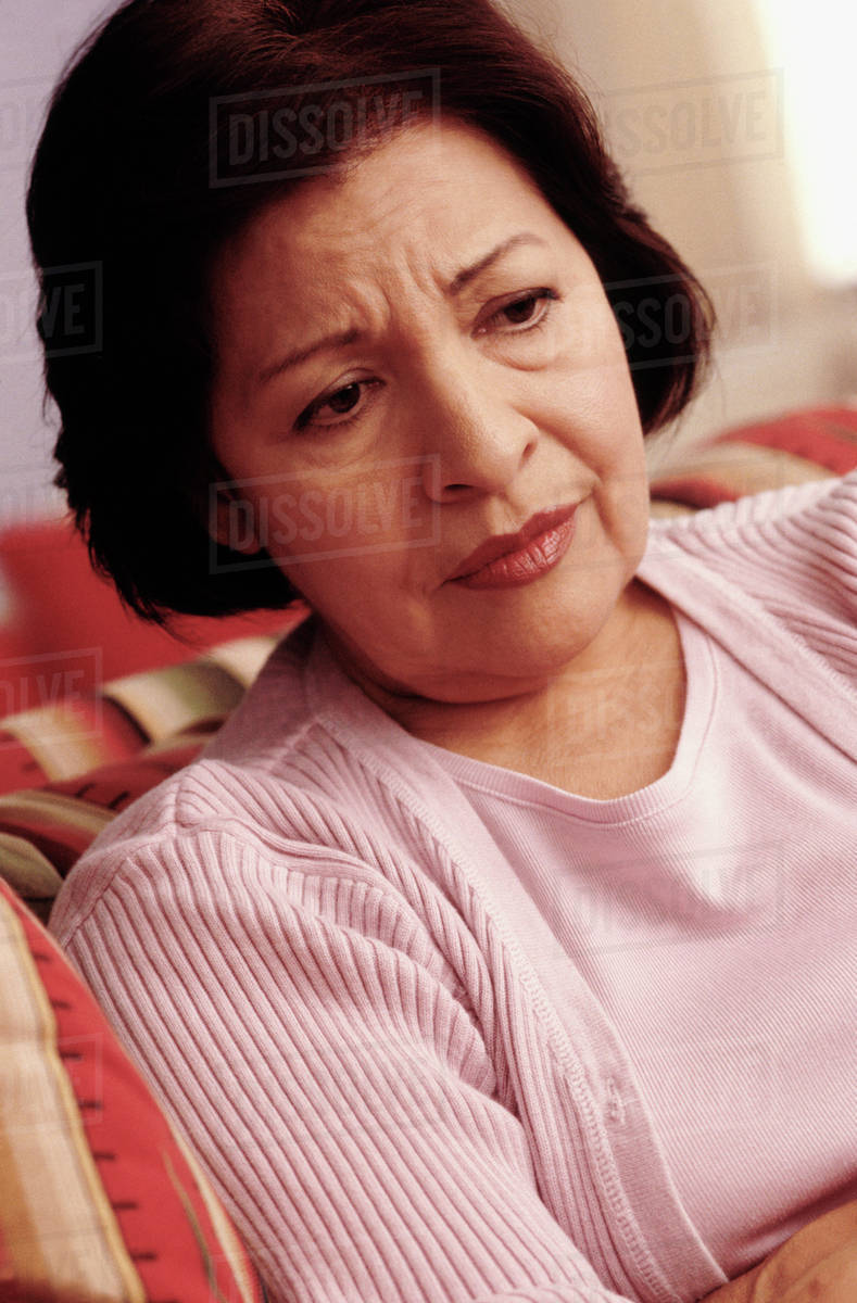 Tense woman - Stock Photo - Dissolve