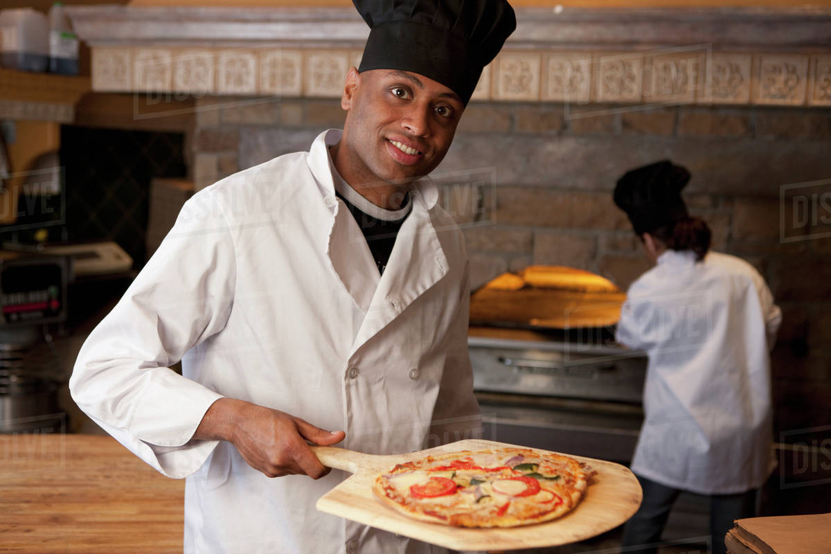Pizza chef - Royalty-free Stock Photo | Dissolve