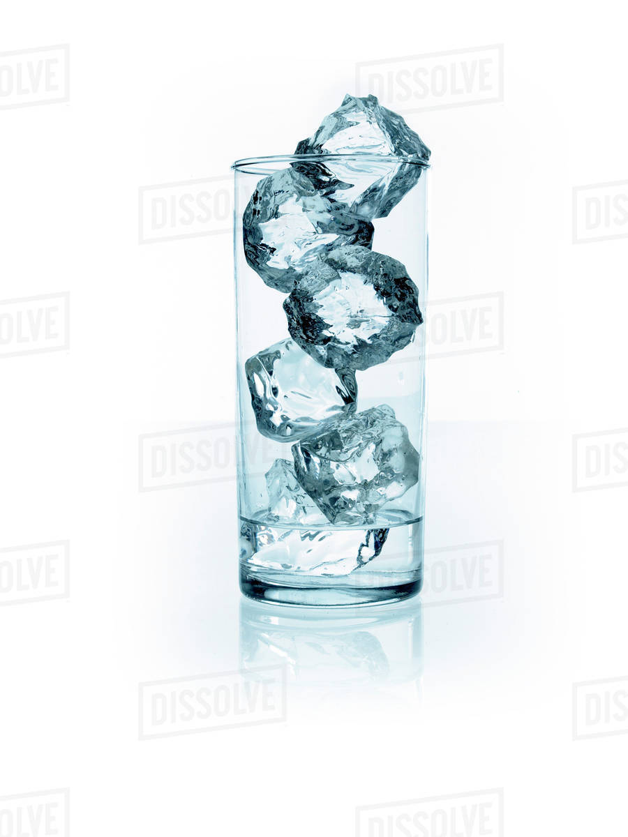 Ice cubes in glass - Royalty-free Stock Photo | Dissolve