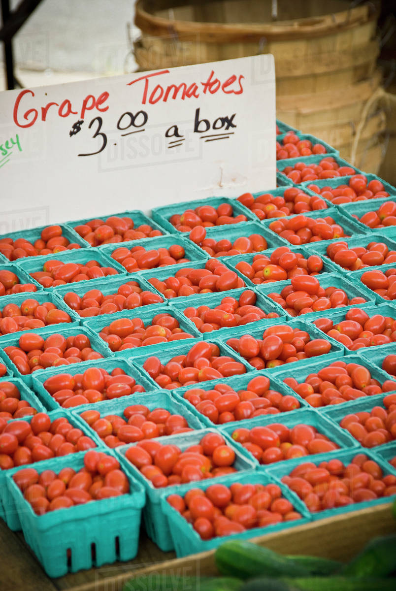 Grape display at farmer's market - Royalty-free Stock Photo | Dissolve