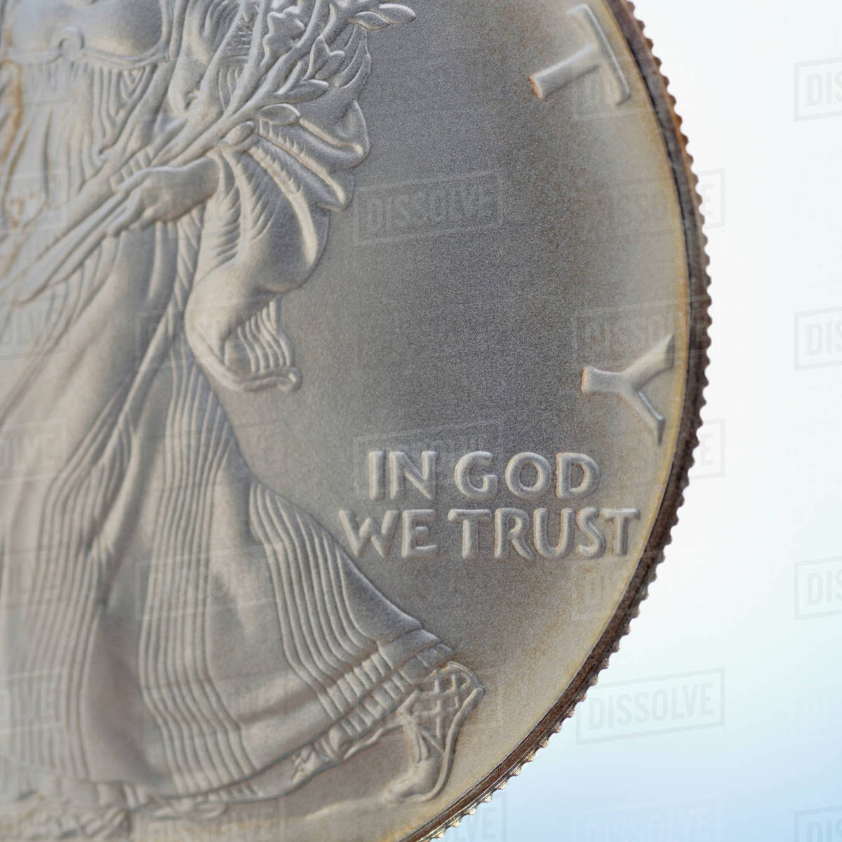 Close up of silver coin - Stock Photo - Dissolve