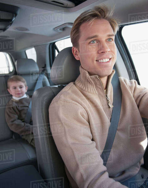 Father driving son to school - Royalty-free Stock Photo | Dissolve