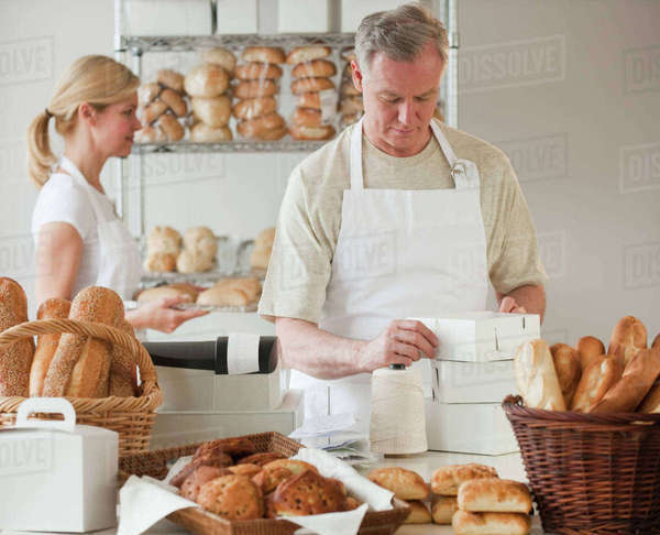 Bakers in a bakery - Royalty-free Stock Photo | Dissolve
