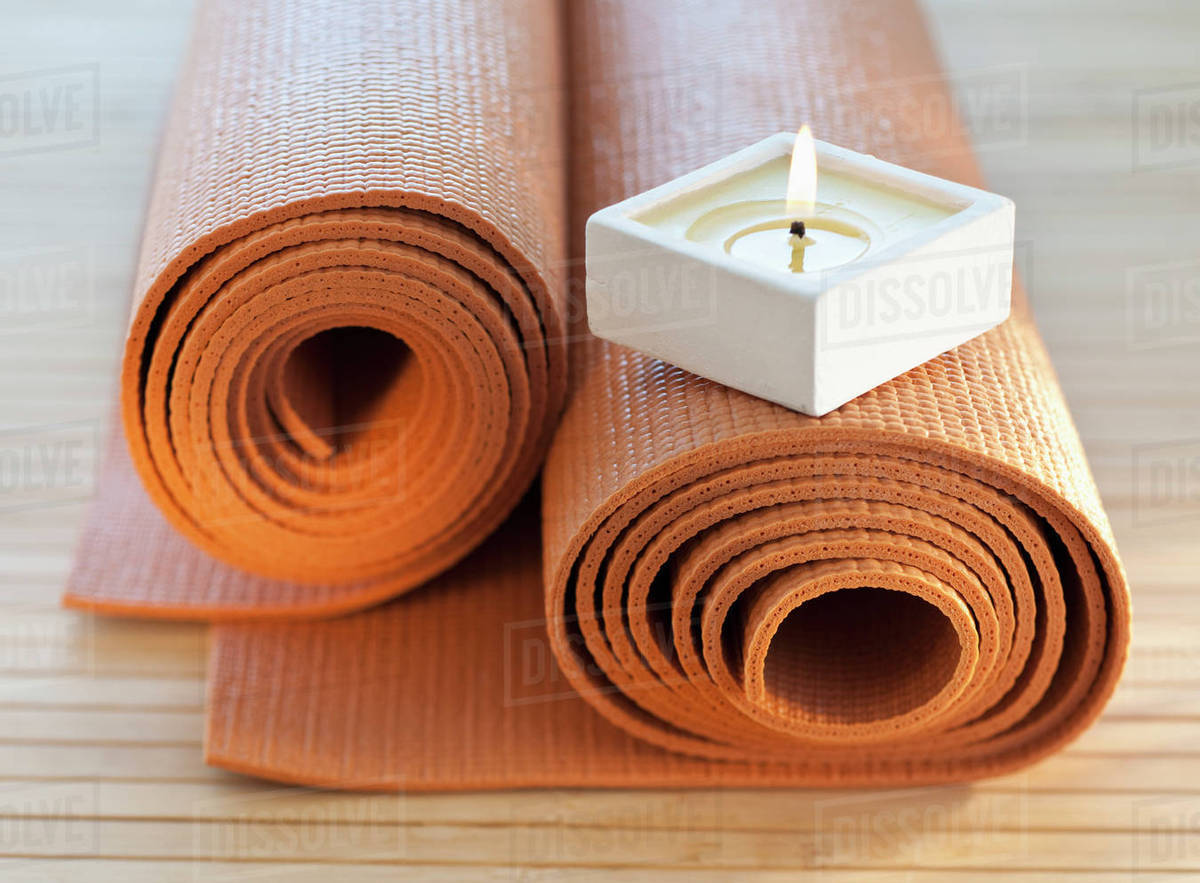 Candle on underpadding - Royalty-free Stock Photo | Dissolve