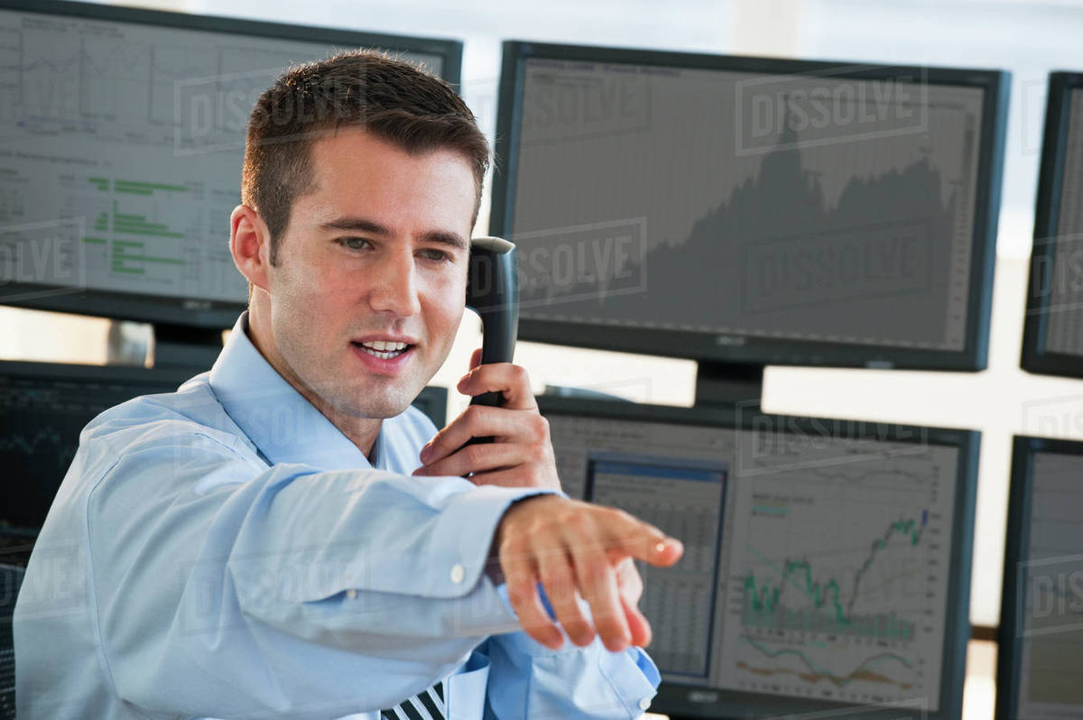 Trader at on phone - Royalty-free Stock Photo | Dissolve