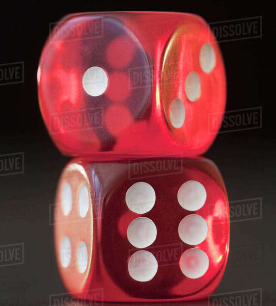 Two red dice - Stock Photo - Dissolve