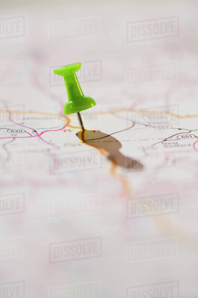 Close up of pin on map location - Royalty-free Stock Photo | Dissolve