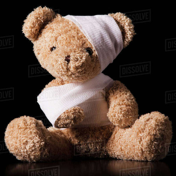 Injured Teddy Bear wrapped in bandage - Royalty-free Stock Photo | Dissolve