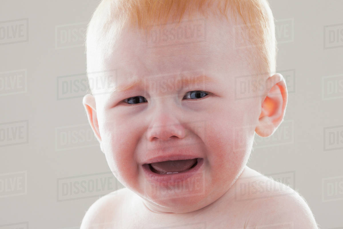 Studio shot portrait of crying baby boy (18-23 months) - Royalty-free ...