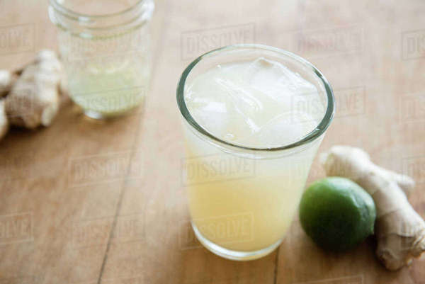 Ginger ale with ice cubes in drinking glass - Royalty-free Stock Photo ...